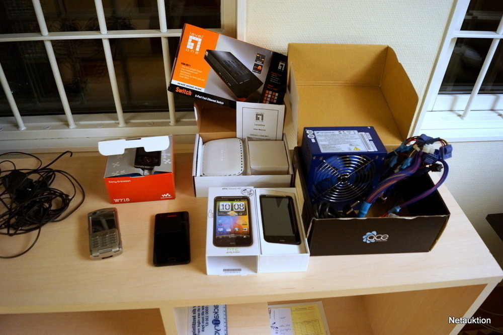 Netauktion - Mobiltelefoner & router